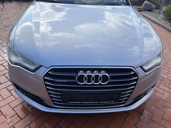 Grey Audi A6 2016 in Akmene, with an engine capacity of 2.97 L and mileage of 260 thousand km for 8500 €, photo 1 on AUTOMOTO.COM.LV