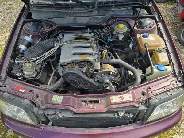 Red Audi A6 1995 in Vilnius, with an engine capacity of 1.97 L and mileage of 350 thousand km for 650 €, photo 3 on AUTOMOTO.COM.LV