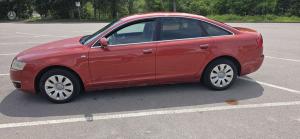 Sarkans Audi A6 2005 Kuršėnai, ar dzinēja tilpumu 1.97 L un nobraukumu 322 tūkst. km par 1500 €, foto  vietnē AUTOMOTO.COM.LV