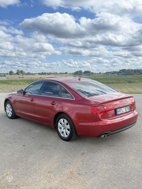 Audi A6 2014 in Siauliai on AUTOMOTO.COM.LV Red Audi A6 2014 in Siauliai, with an engine capacity of 1.97 L and mileage of 367 thousand km for 8200 β¬, photo 4 on AUTOMOTO.COM.LV