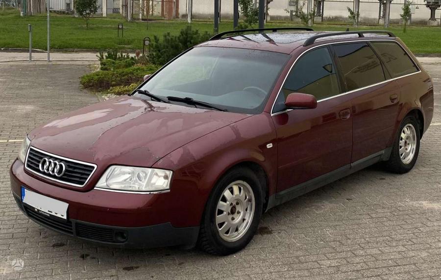 Red Audi A6 1998 in Vilnius, with an engine capacity of 2.39 L and mileage of 304 thousand km for 899 €, photo 1 on AUTOMOTO.COM.LV