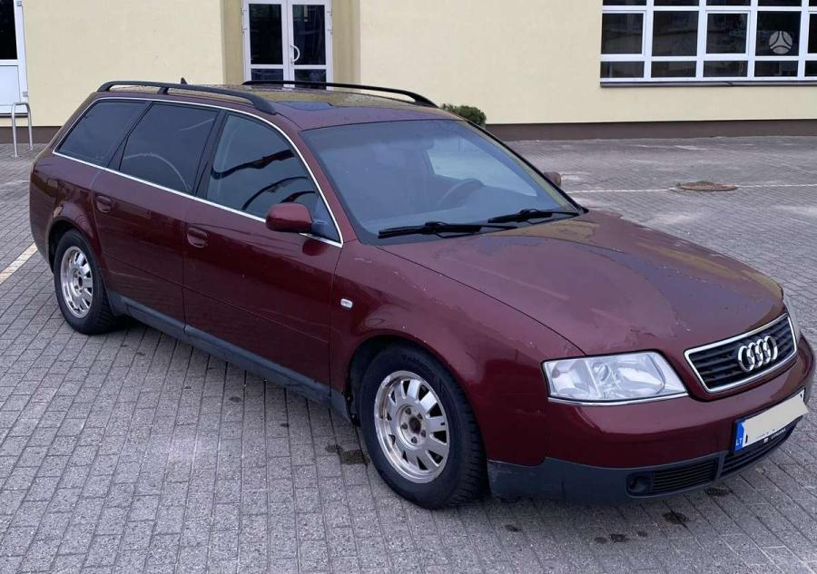 Red Audi A6 1998 in Vilnius, with an engine capacity of 2.39 L and mileage of 304 thousand km for 899 €, photo 5 on AUTOMOTO.COM.LV