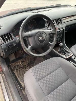 Red Audi A6 1998 in Vilnius, with an engine capacity of 2.39 L and mileage of 304 thousand km for 899 €, photo 6 on AUTOMOTO.COM.LV