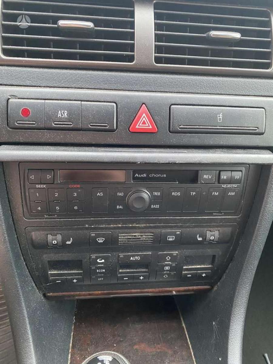 Red Audi A6 1998 in Vilnius, with an engine capacity of 2.39 L and mileage of 304 thousand km for 899 €, photo 10 on AUTOMOTO.COM.LV
