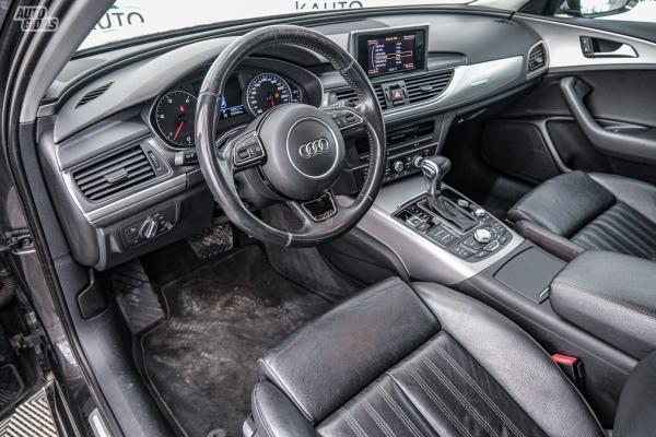 Audi A6 2012 in Kaunas, with an engine capacity of 3.00 L and mileage of 245 thousand km for 10590 €, photo 5 on AUTOMOTO.COM.LV