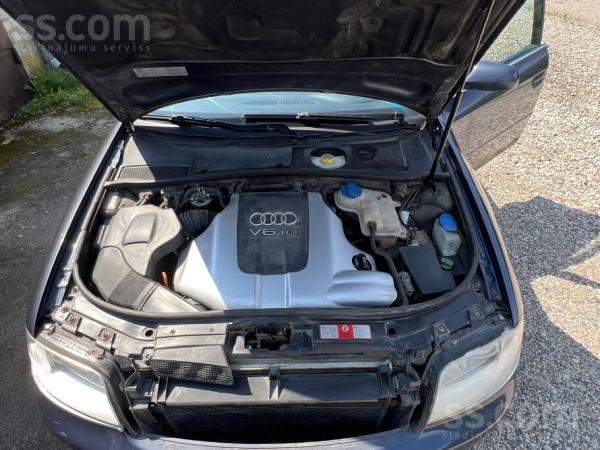 Violets Audi A6 2003 Rīga, ar dzinēja tilpumu 2.50 L un nobraukumu 353 tūkst. km par 800 €, foto 6 vietnē AUTOMOTO.COM.LV