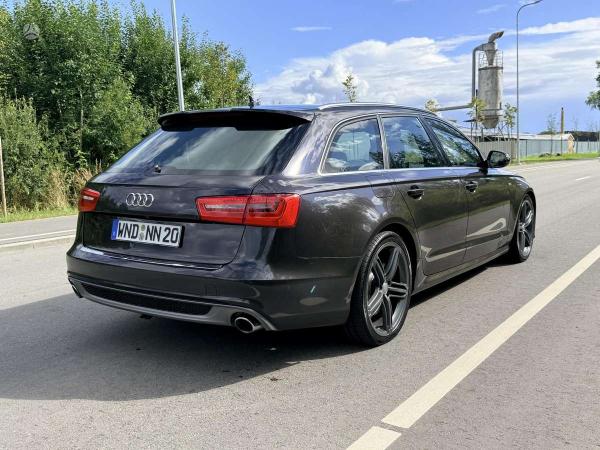 Violet Audi A6 2013 in Panevezys, with an engine capacity of 2.97 L and mileage of 335 thousand km for 8550 €, photo 8 on AUTOMOTO.COM.LV