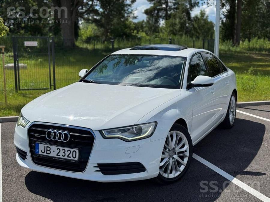 White Audi A6 2011 in Riga, with an engine capacity of 3.00 L and mileage of 297 thousand km for 7950 €, photo 4 on AUTOMOTO.COM.LV