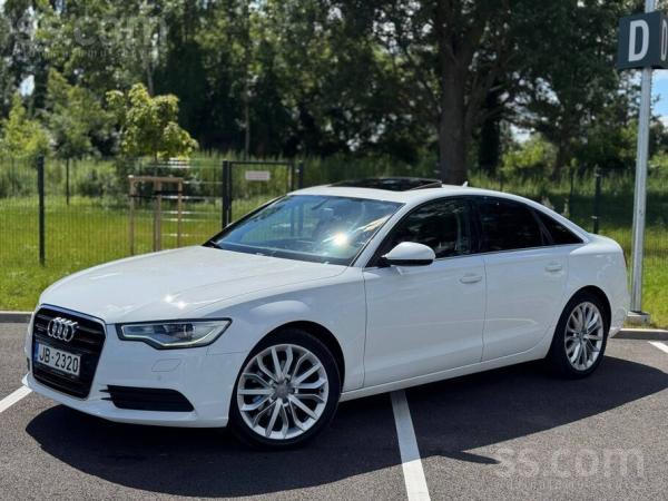 White Audi A6 2011 in Riga, with an engine capacity of 3.00 L and mileage of 297 thousand km for 7950 €, photo 4 on AUTOMOTO.COM.LV