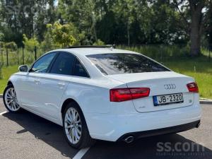 White Audi A6 2011 in Riga, with an engine capacity of 3.00 L and mileage of 297 thousand km for 7950 €, photo 6 on AUTOMOTO.COM.LV