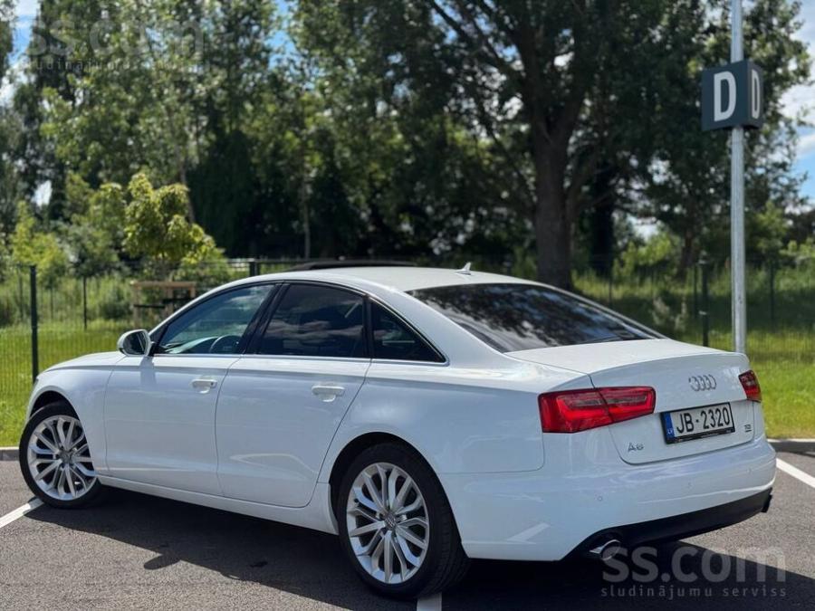 White Audi A6 2011 in Riga, with an engine capacity of 3.00 L and mileage of 297 thousand km for 7950 €, photo 7 on AUTOMOTO.COM.LV