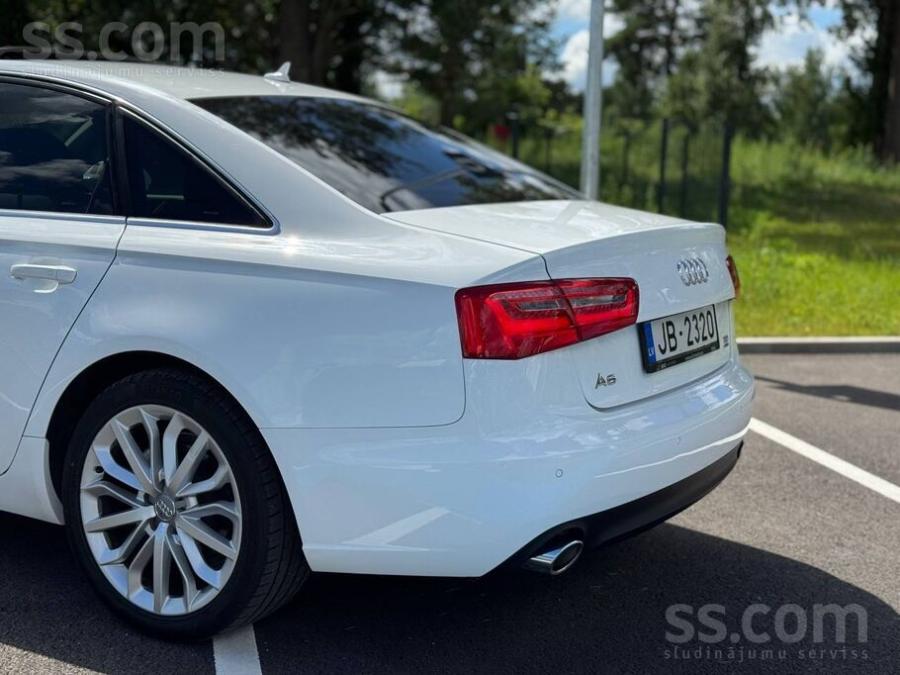 White Audi A6 2011 in Riga, with an engine capacity of 3.00 L and mileage of 297 thousand km for 7950 €, photo 8 on AUTOMOTO.COM.LV