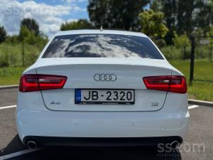 White Audi A6 2011 in Riga, with an engine capacity of 3.00 L and mileage of 297 thousand km for 7950 €, photo 9 on AUTOMOTO.COM.LV