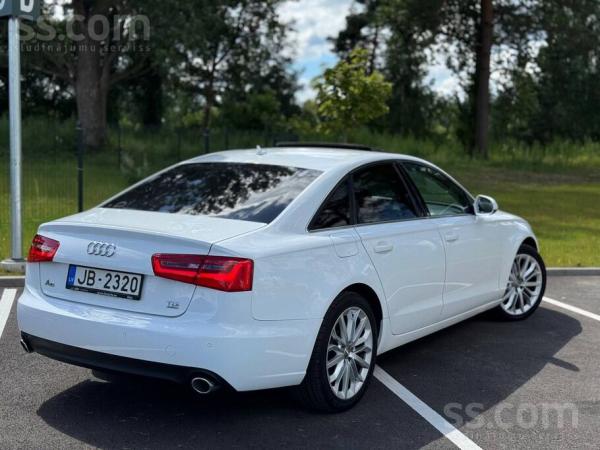 White Audi A6 2011 in Riga, with an engine capacity of 3.00 L and mileage of 297 thousand km for 7950 €, photo 10 on AUTOMOTO.COM.LV