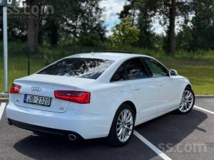 White Audi A6 2011 in Riga, with an engine capacity of 3.00 L and mileage of 297 thousand km for 7950 €, photo 11 on AUTOMOTO.COM.LV