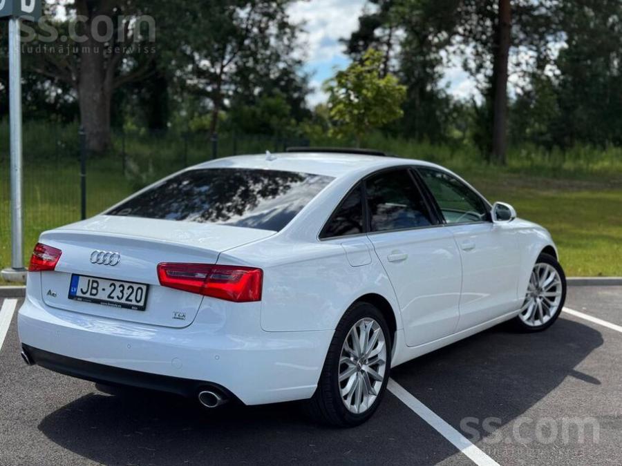 White Audi A6 2011 in Riga, with an engine capacity of 3.00 L and mileage of 297 thousand km for 7950 €, photo 11 on AUTOMOTO.COM.LV