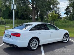 White Audi A6 2011 in Riga, with an engine capacity of 3.00 L and mileage of 297 thousand km for 7950 €, photo 12 on AUTOMOTO.COM.LV