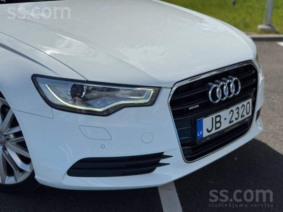 White Audi A6 2011 in Riga, with an engine capacity of 3.00 L and mileage of 297 thousand km for 7950 €, photo 13 on AUTOMOTO.COM.LV