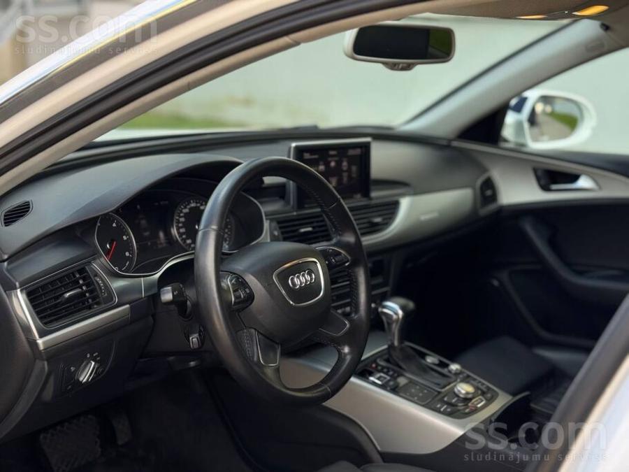White Audi A6 2011 in Riga, with an engine capacity of 3.00 L and mileage of 297 thousand km for 7950 €, photo 27 on AUTOMOTO.COM.LV