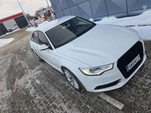 White Audi A6 2012 in Silute, with an engine capacity of 2.00 L and mileage of 217 thousand km for 6850 €, photo 6 on AUTOMOTO.COM.LV