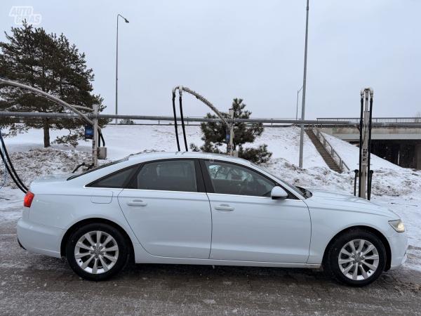 White Audi A6 2012 in Vilnius, with an engine capacity of 3.00 L and mileage of 307 thousand km for 9350 €, photo 4 on AUTOMOTO.COM.LV