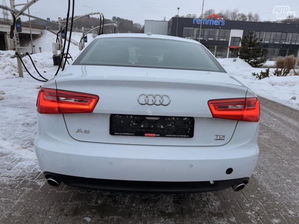 White Audi A6 2012 in Vilnius, with an engine capacity of 3.00 L and mileage of 307 thousand km for 9350 €, photo 6 on AUTOMOTO.COM.LV