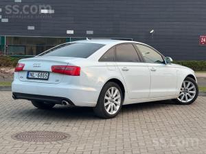 White Audi A6 2012 in Riga, with an engine capacity of 3.00 L and mileage of 299 thousand km for 12100 €, photo 5 on AUTOMOTO.COM.LV