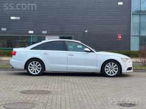 White Audi A6 2012 in Riga, with an engine capacity of 3.00 L and mileage of 299 thousand km for 12100 €, photo 7 on AUTOMOTO.COM.LV