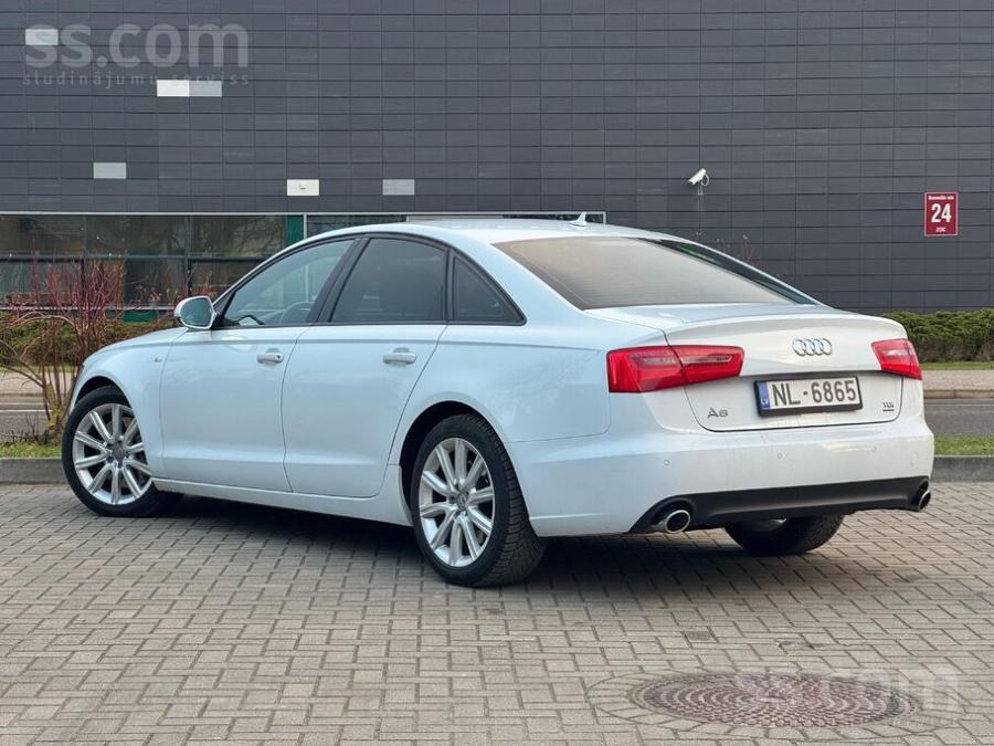 White Audi A6 2012 in Riga, with an engine capacity of 3.00 L and mileage of 299 thousand km for 12100 €, photo 8 on AUTOMOTO.COM.LV