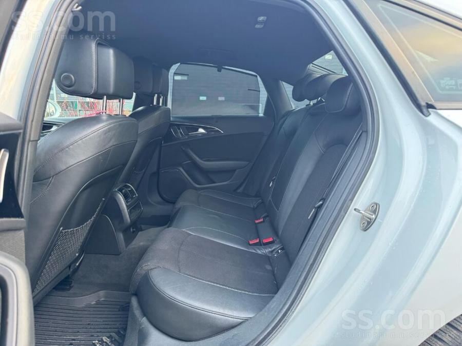 White Audi A6 2012 in Riga, with an engine capacity of 3.00 L and mileage of 299 thousand km for 12100 €, photo 16 on AUTOMOTO.COM.LV