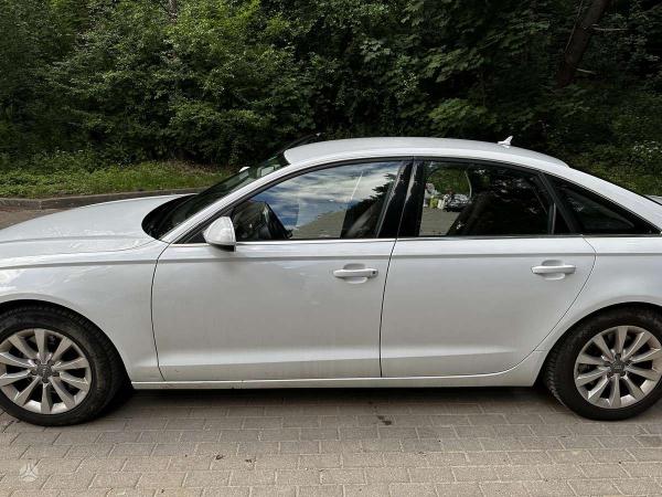 White Audi A6 2012 in Vilnius, with an engine capacity of 2.97 L and mileage of 311 thousand km for 9000 €, photo 4 on AUTOMOTO.COM.LV