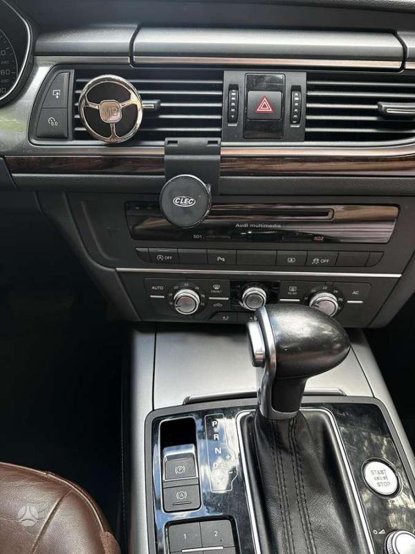 White Audi A6 2012 in Vilnius, with an engine capacity of 2.97 L and mileage of 311 thousand km for 9000 €, photo 6 on AUTOMOTO.COM.LV