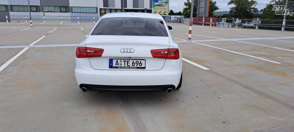 White Audi A6 2012 in Taurage, with an engine capacity of 3.00 L and mileage of 245 thousand km for 12500 €, photo 5 on AUTOMOTO.COM.LV