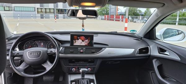 White Audi A6 2012 in Taurage, with an engine capacity of 3.00 L and mileage of 245 thousand km for 12500 €, photo 9 on AUTOMOTO.COM.LV