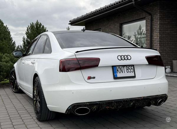 White Audi A6 2012 in Kaunas, with an engine capacity of 3.00 L and mileage of 396 thousand km for 8550 €, photo 4 on AUTOMOTO.COM.LV