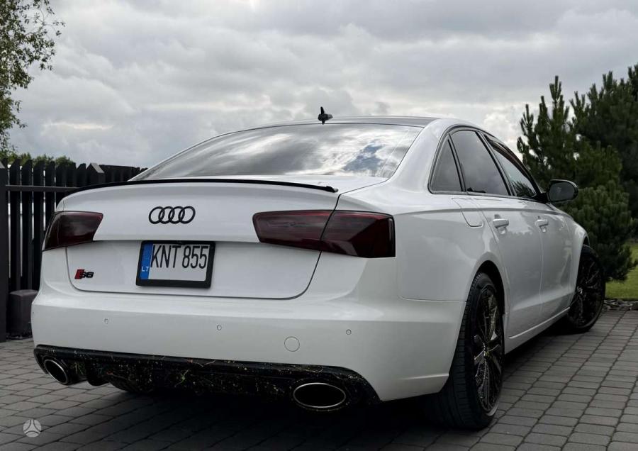 White Audi A6 2012 in Kaunas, with an engine capacity of 3.00 L and mileage of 396 thousand km for 8550 €, photo 6 on AUTOMOTO.COM.LV