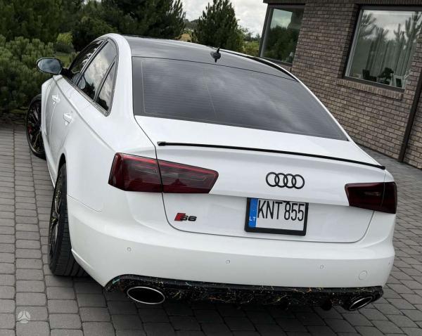 White Audi A6 2012 in Kaunas, with an engine capacity of 3.00 L and mileage of 396 thousand km for 8550 €, photo 8 on AUTOMOTO.COM.LV