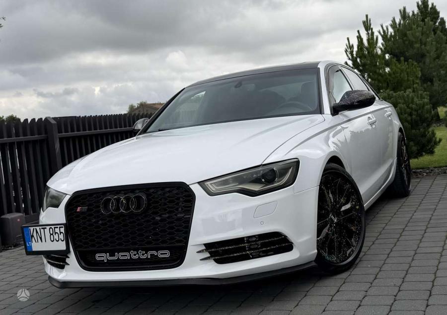White Audi A6 2012 in Kaunas, with an engine capacity of 3.00 L and mileage of 396 thousand km for 8550 €, photo 12 on AUTOMOTO.COM.LV