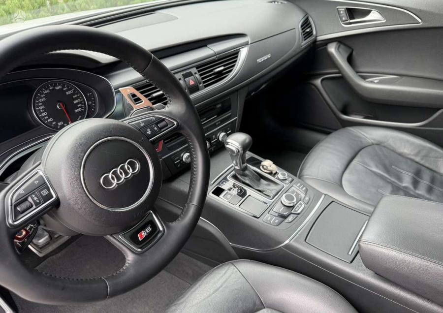 White Audi A6 2012 in Kaunas, with an engine capacity of 3.00 L and mileage of 396 thousand km for 8550 €, photo 32 on AUTOMOTO.COM.LV