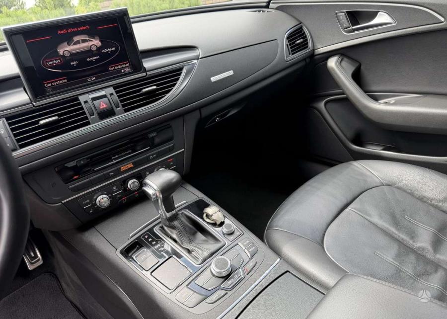 White Audi A6 2012 in Kaunas, with an engine capacity of 3.00 L and mileage of 396 thousand km for 8550 €, photo 33 on AUTOMOTO.COM.LV