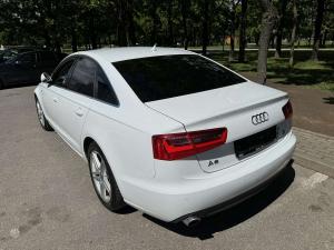 White Audi A6 2013 in Kaunas, with an engine capacity of 3.00 L and mileage of 289 thousand km for 9090 €, photo 5 on AUTOMOTO.COM.LV