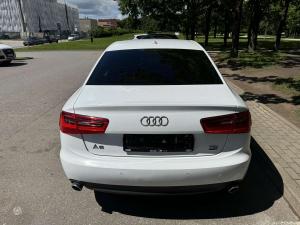 White Audi A6 2013 in Kaunas, with an engine capacity of 3.00 L and mileage of 289 thousand km for 9090 €, photo 8 on AUTOMOTO.COM.LV