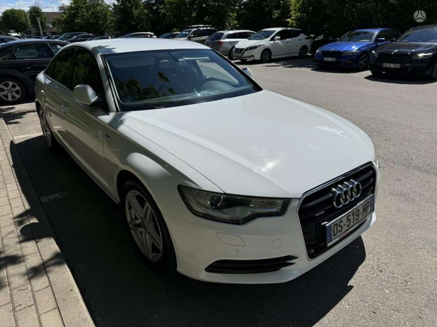 White Audi A6 2013 in Kaunas, with an engine capacity of 3.00 L and mileage of 289 thousand km for 9090 €, photo 13 on AUTOMOTO.COM.LV