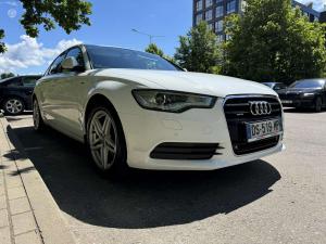 White Audi A6 2013 in Kaunas, with an engine capacity of 3.00 L and mileage of 289 thousand km for 9090 €, photo 14 on AUTOMOTO.COM.LV