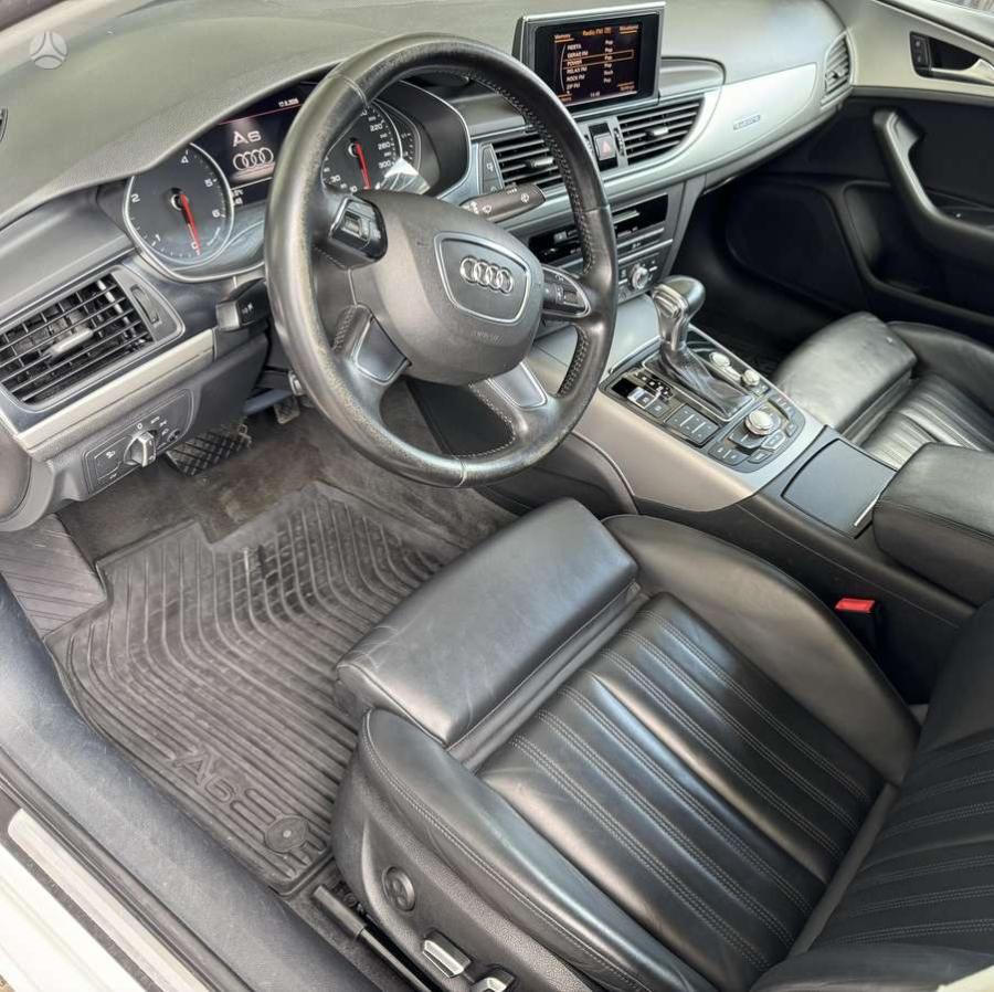 White Audi A6 2013 in Kaunas, with an engine capacity of 3.00 L and mileage of 289 thousand km for 9090 €, photo 16 on AUTOMOTO.COM.LV