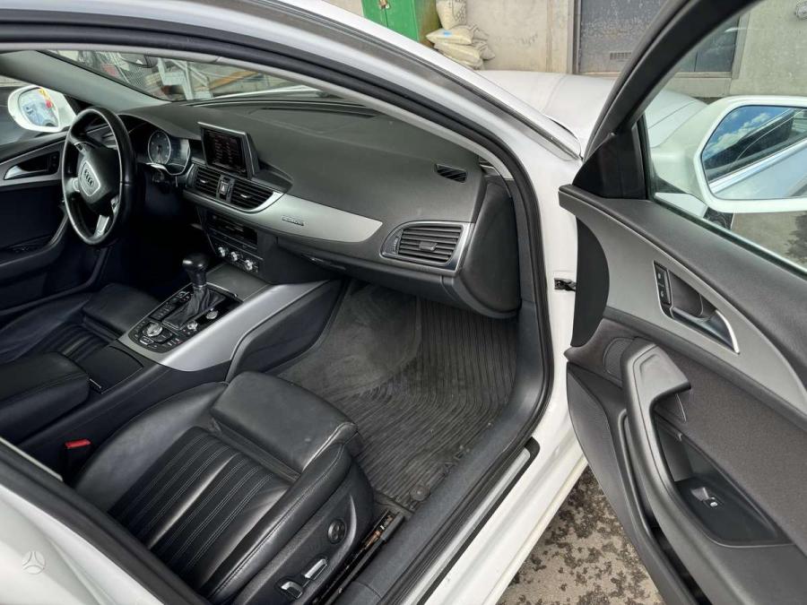 White Audi A6 2013 in Kaunas, with an engine capacity of 3.00 L and mileage of 289 thousand km for 9090 €, photo 20 on AUTOMOTO.COM.LV