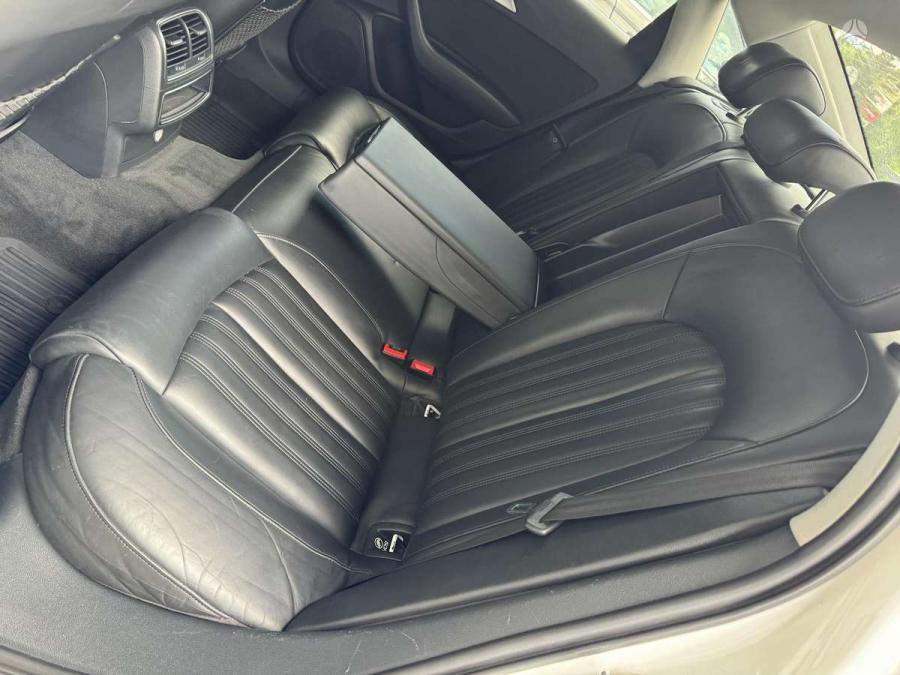White Audi A6 2013 in Kaunas, with an engine capacity of 3.00 L and mileage of 289 thousand km for 9090 €, photo 26 on AUTOMOTO.COM.LV