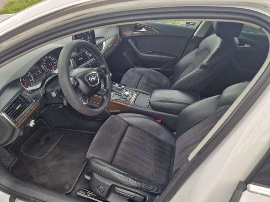 White Audi A6 2013 in Kaunas, with an engine capacity of 2.97 L and mileage of 241 thousand km for 11500 €, photo 13 on AUTOMOTO.COM.LV