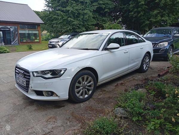 White Audi A6 2013 in Jonava, with an engine capacity of 1.97 L and mileage of 178 thousand km for 2900 €, photo 2 on AUTOMOTO.COM.LV