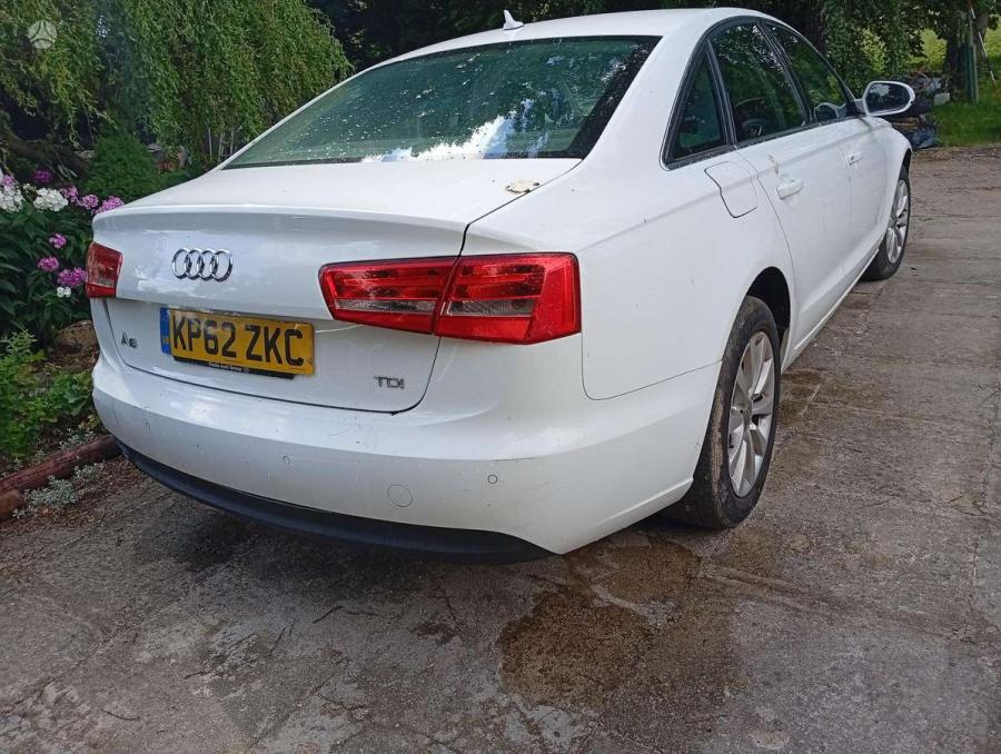 White Audi A6 2013 in Jonava, with an engine capacity of 1.97 L and mileage of 178 thousand km for 2900 €, photo 4 on AUTOMOTO.COM.LV